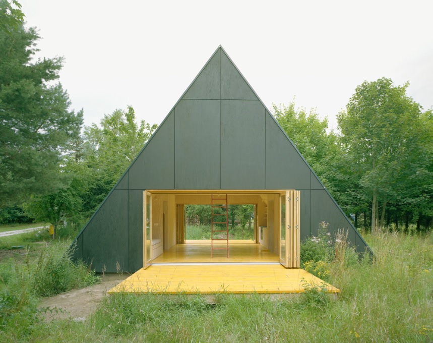 A-Frame timber house disguises a three level family home - Micromansional